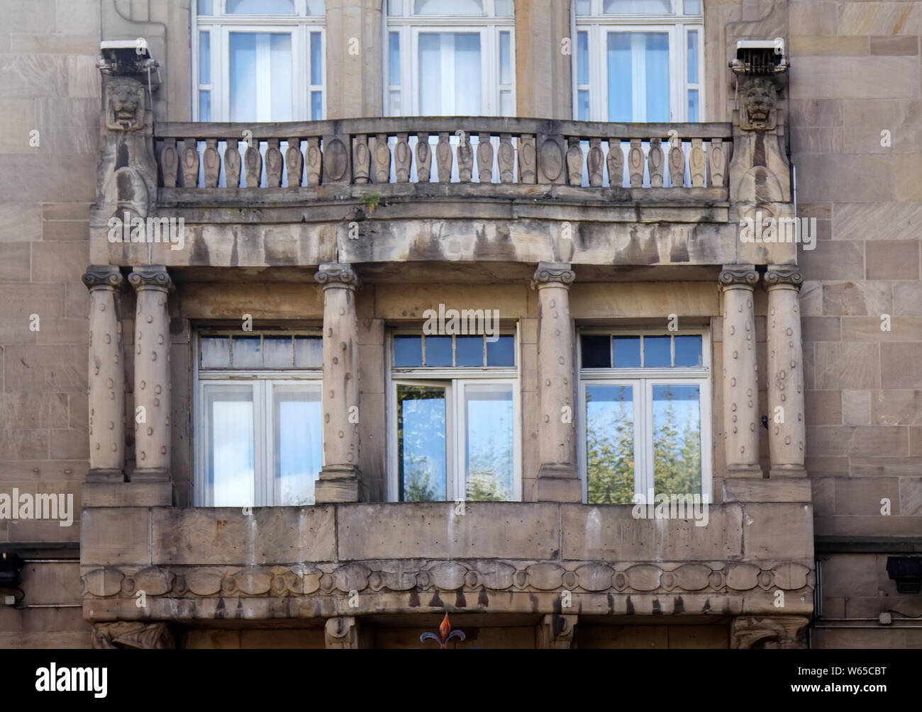 Massive stone balcony, decorative balcony with lions and columns Stock ...
