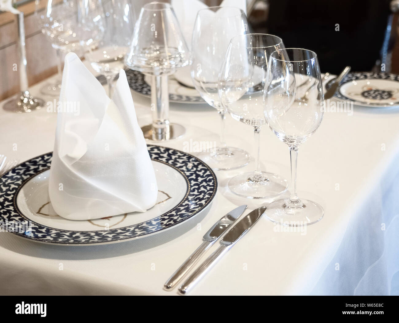 Restaurant Table Set Up With Wine Glass And Cutlery Stock Photo - Alamy