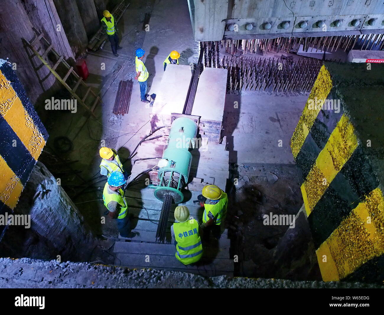 An 18,800-tonne box girder bridge is rotating 86.5 degrees ...