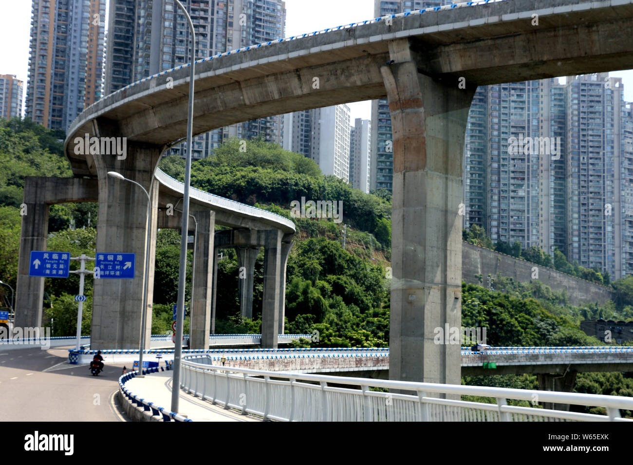 Cars drive on China's tallest highway interchange, Sujiaba Interchange ...