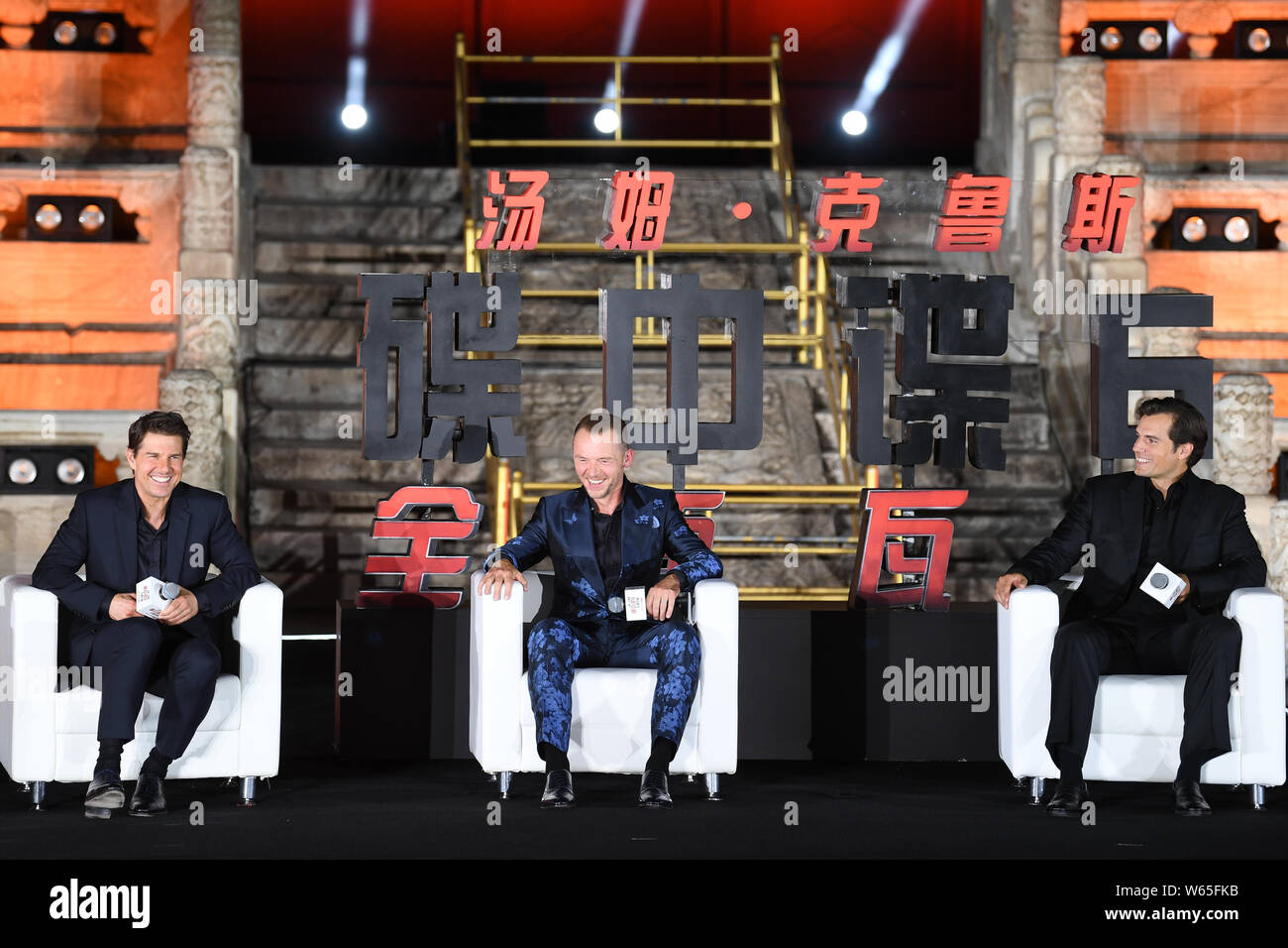 (From left) American actor and producer Tom Cruise, English actor Simon ...