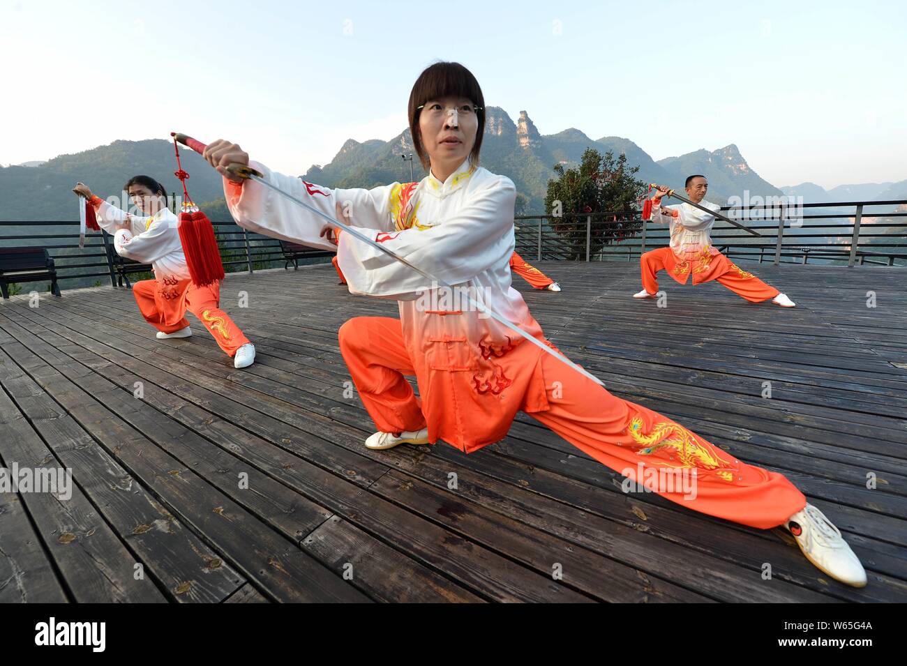 Tai chi enthusiasts practise shadow-boxing (Taiji, Taichi or Tai-chi ...