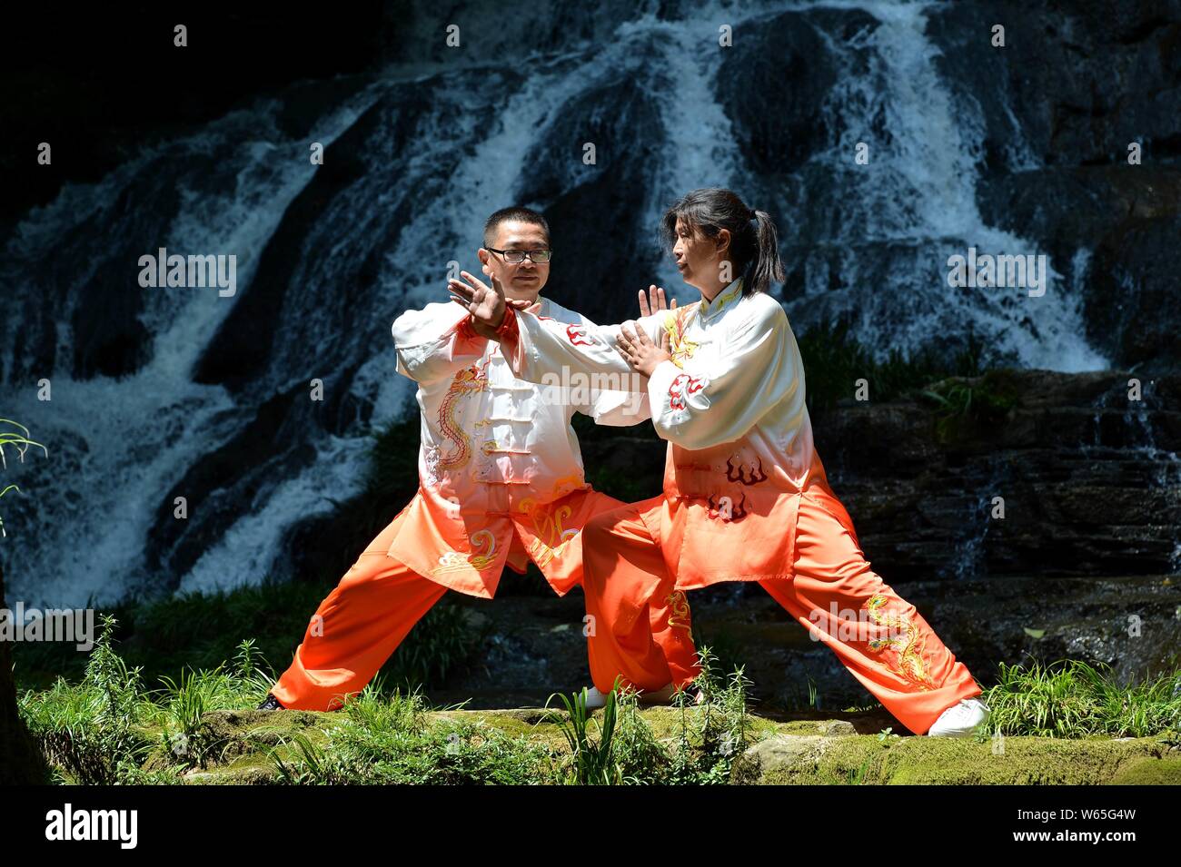 Tai chi enthusiasts practise shadow-boxing (Taiji, Taichi or Tai-chi ...