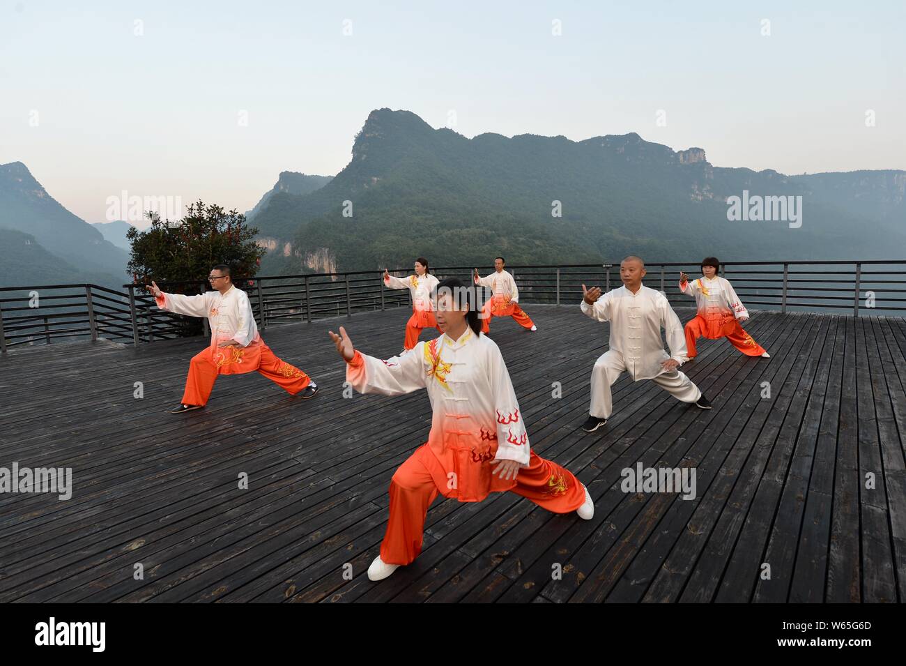 Tai chi enthusiasts practise shadow-boxing (Taiji, Taichi or Tai-chi ...