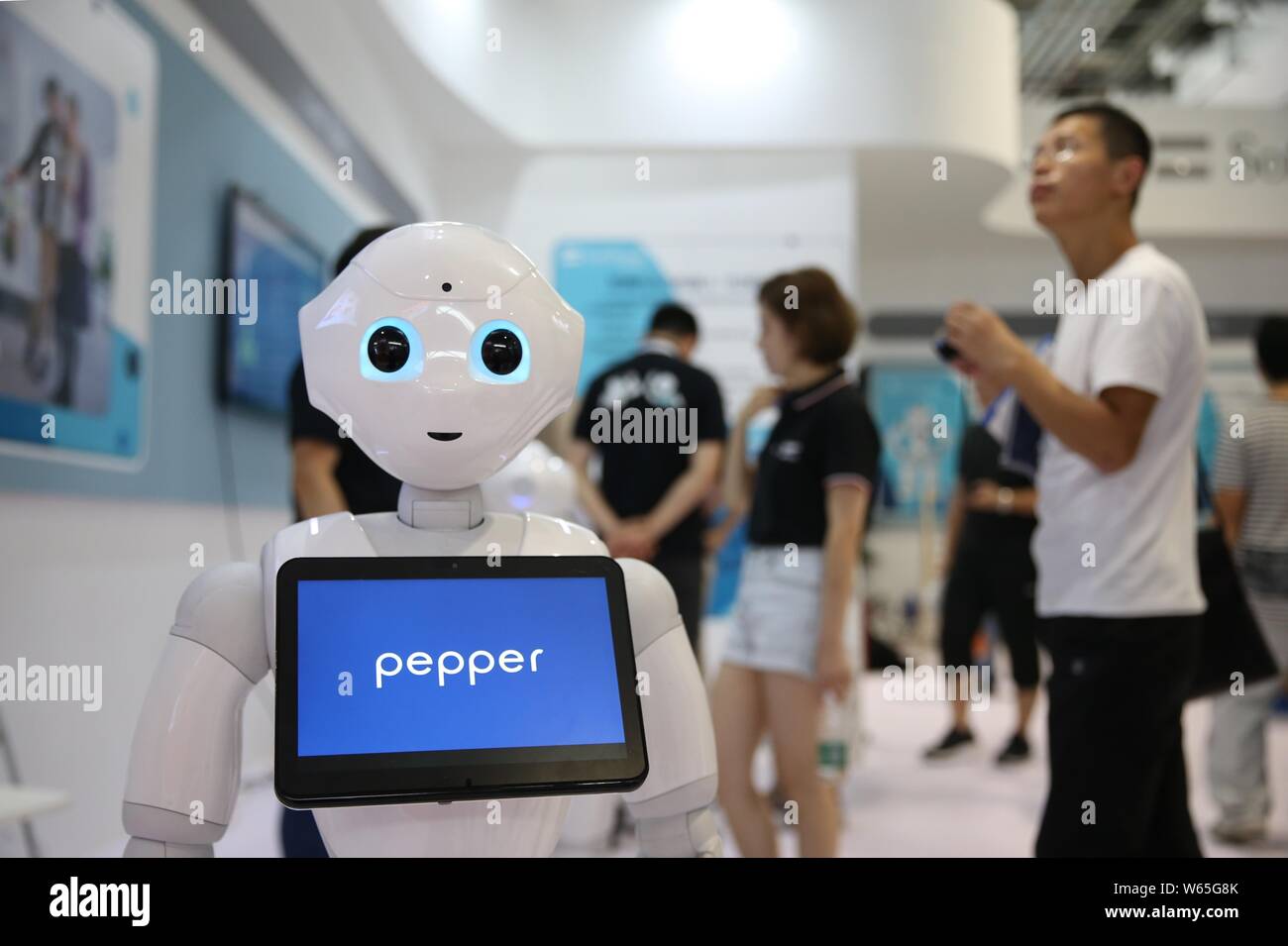 Pepper, a semi-humanoid robot manufactured by SoftBank Robotics, is on ...