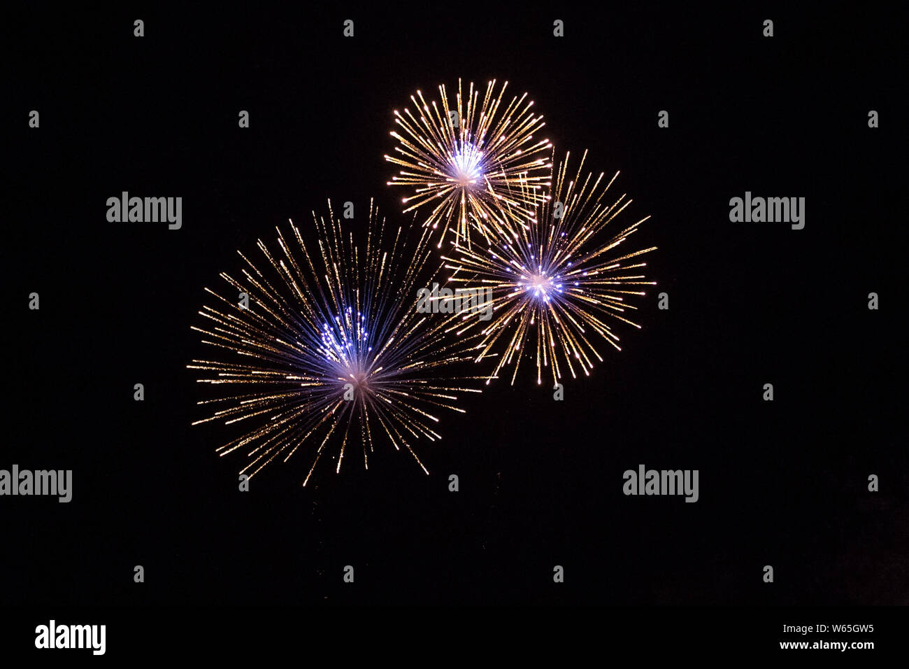 Low Angle View of firework display against black sky Stock Photo - Alamy