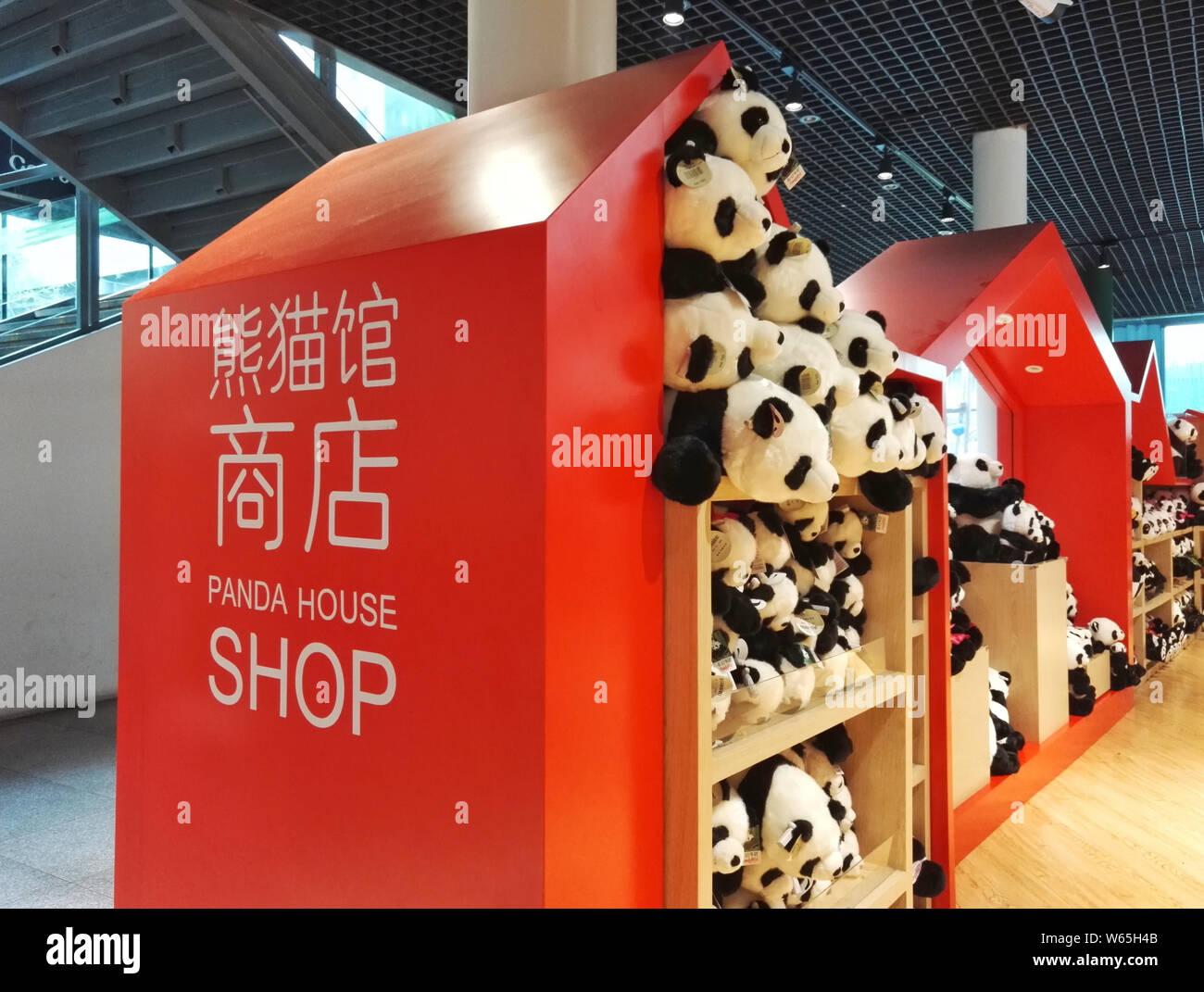 Panda-themed souvenirs are for sale at the Giant Panda House Shop in ...
