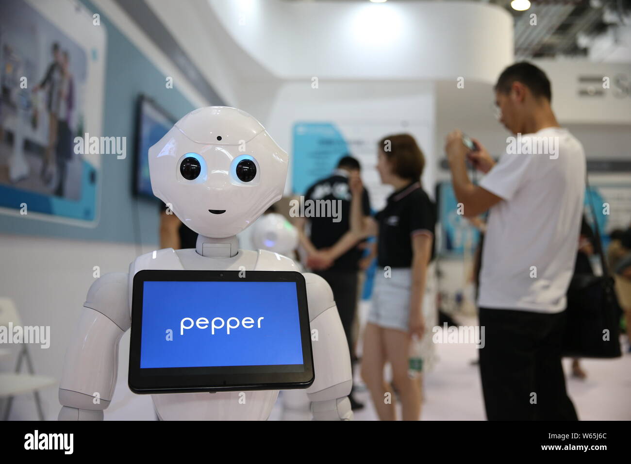 Pepper, a semi-humanoid robot manufactured by SoftBank Robotics, is on ...