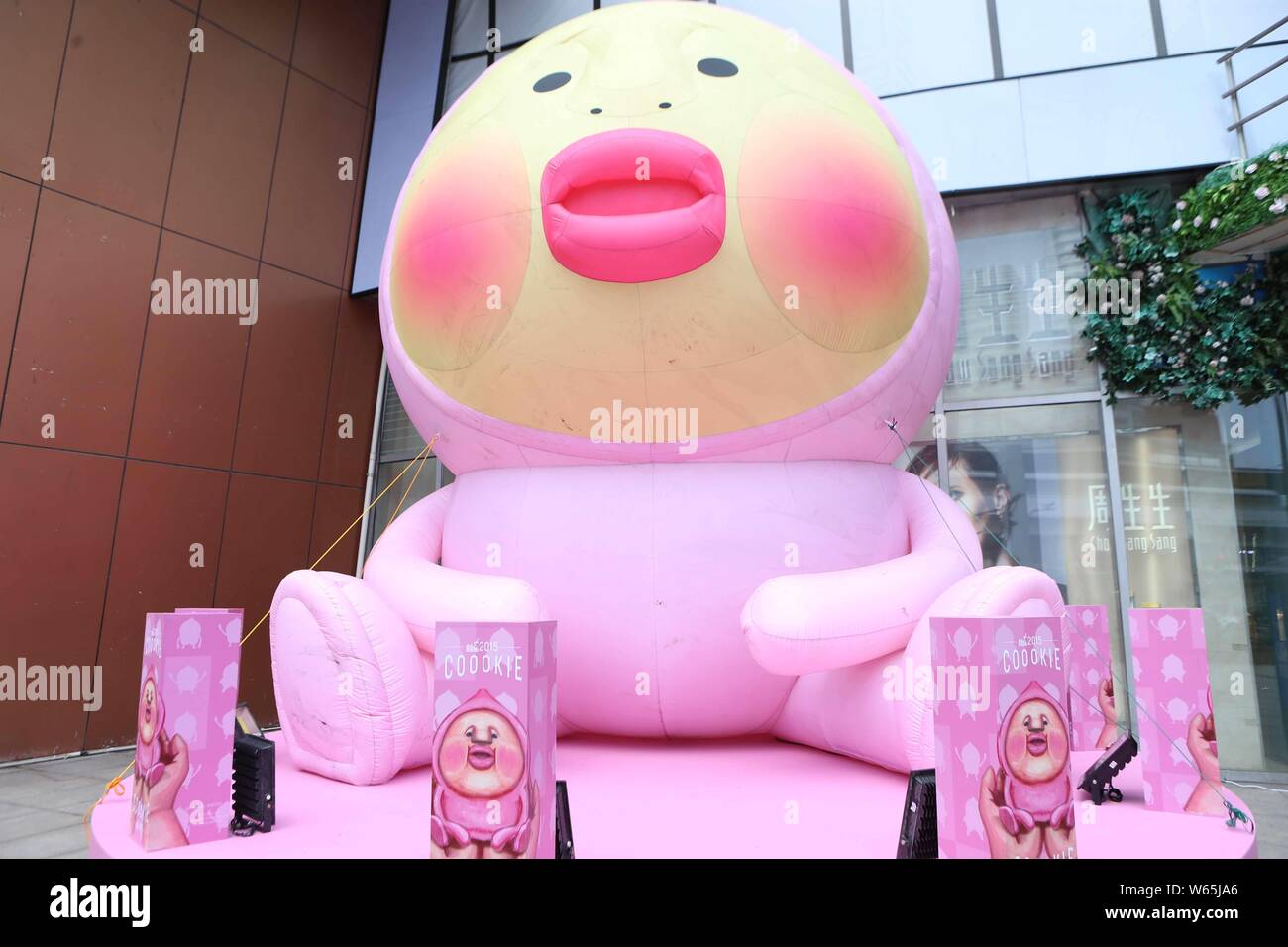 A six-meter-tall Kobitos sculpture is on display during a special exhibition themed on Kobitos ...