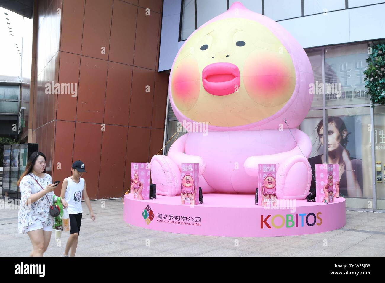 A six-meter-tall Kobitos sculpture is on display during a special exhibition themed on Kobitos ...