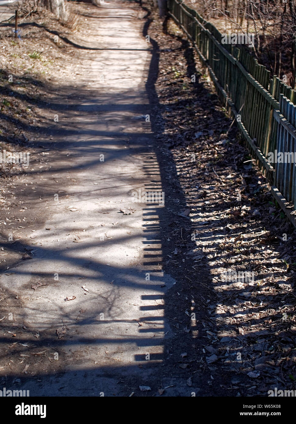 footpath along the fence in spring, Russia Stock Photo - Alamy