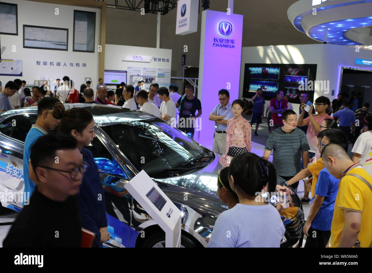 --FILE--People visit the stand of Changan Automobile during an auto ...