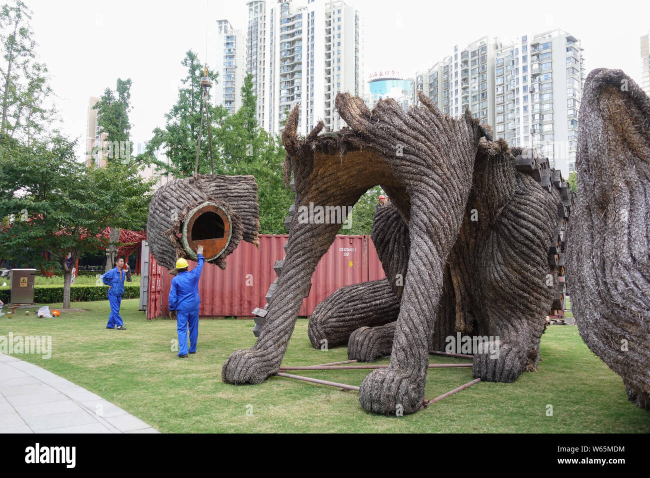 The 7-meter- high and 10-meter-long metal-and-straw sculpture "Urban ...