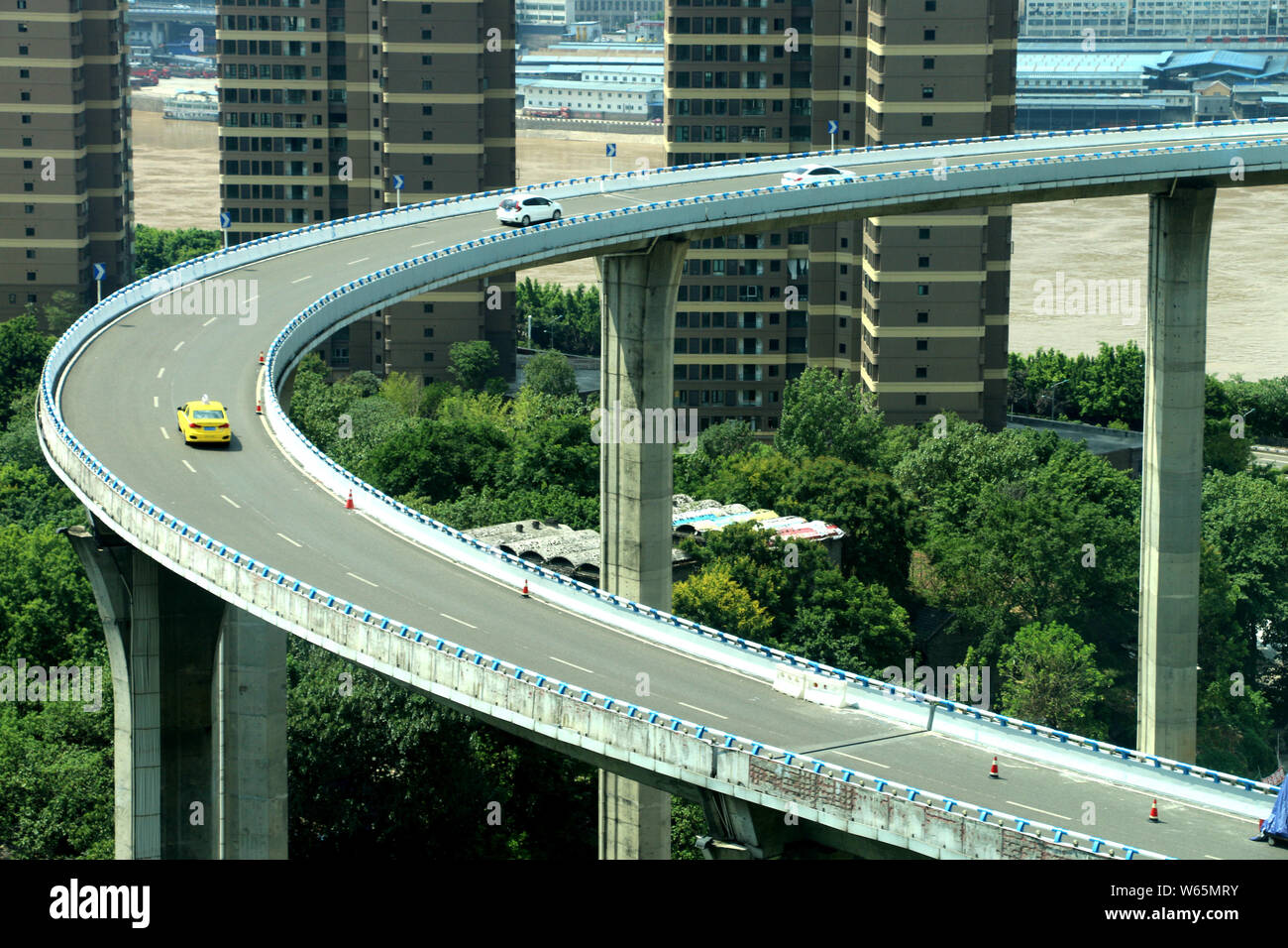 Cars drive on China's tallest highway interchange, Sujiaba Interchange ...