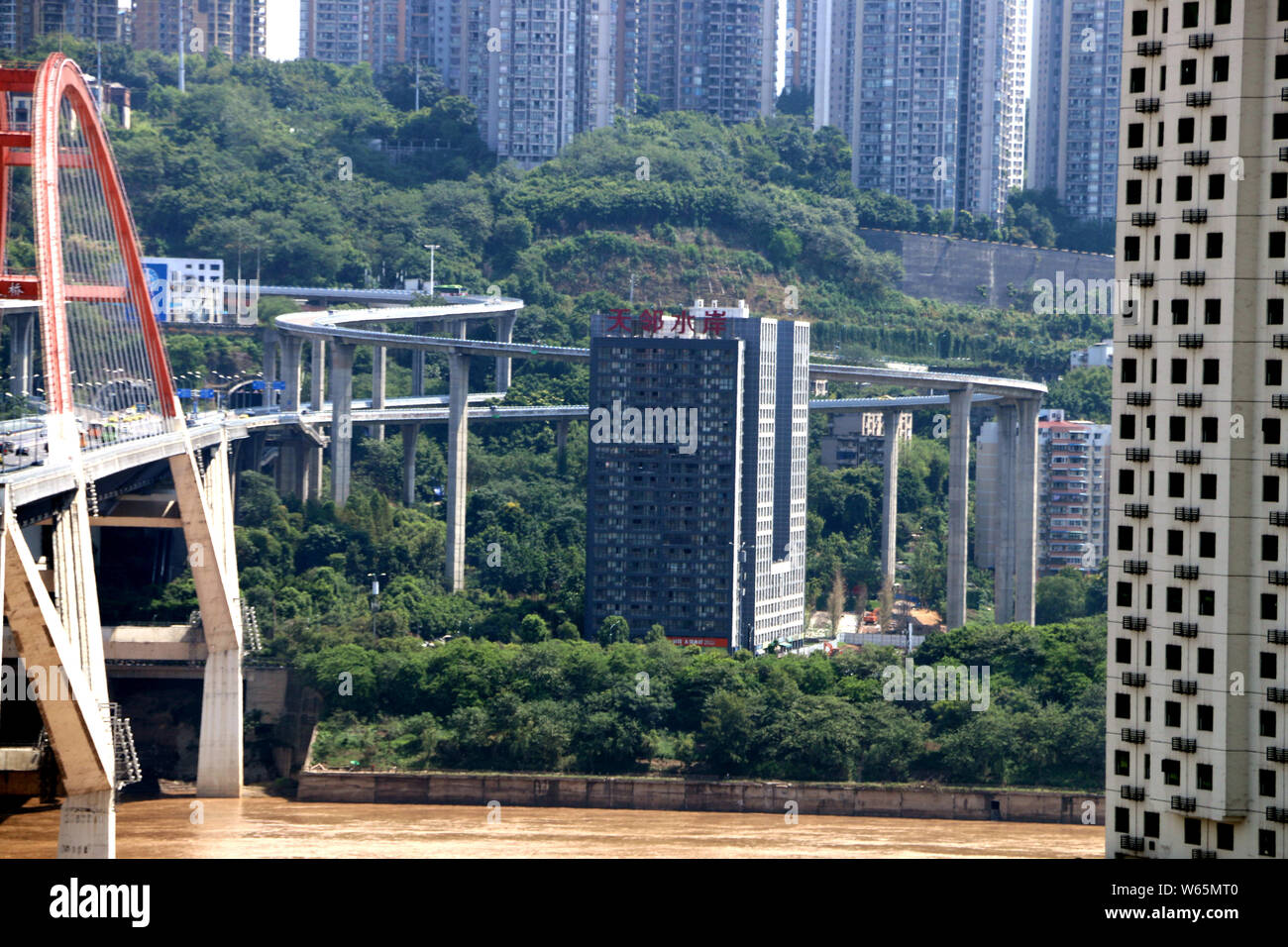 Cars drive on China's tallest highway interchange, Sujiaba Interchange ...