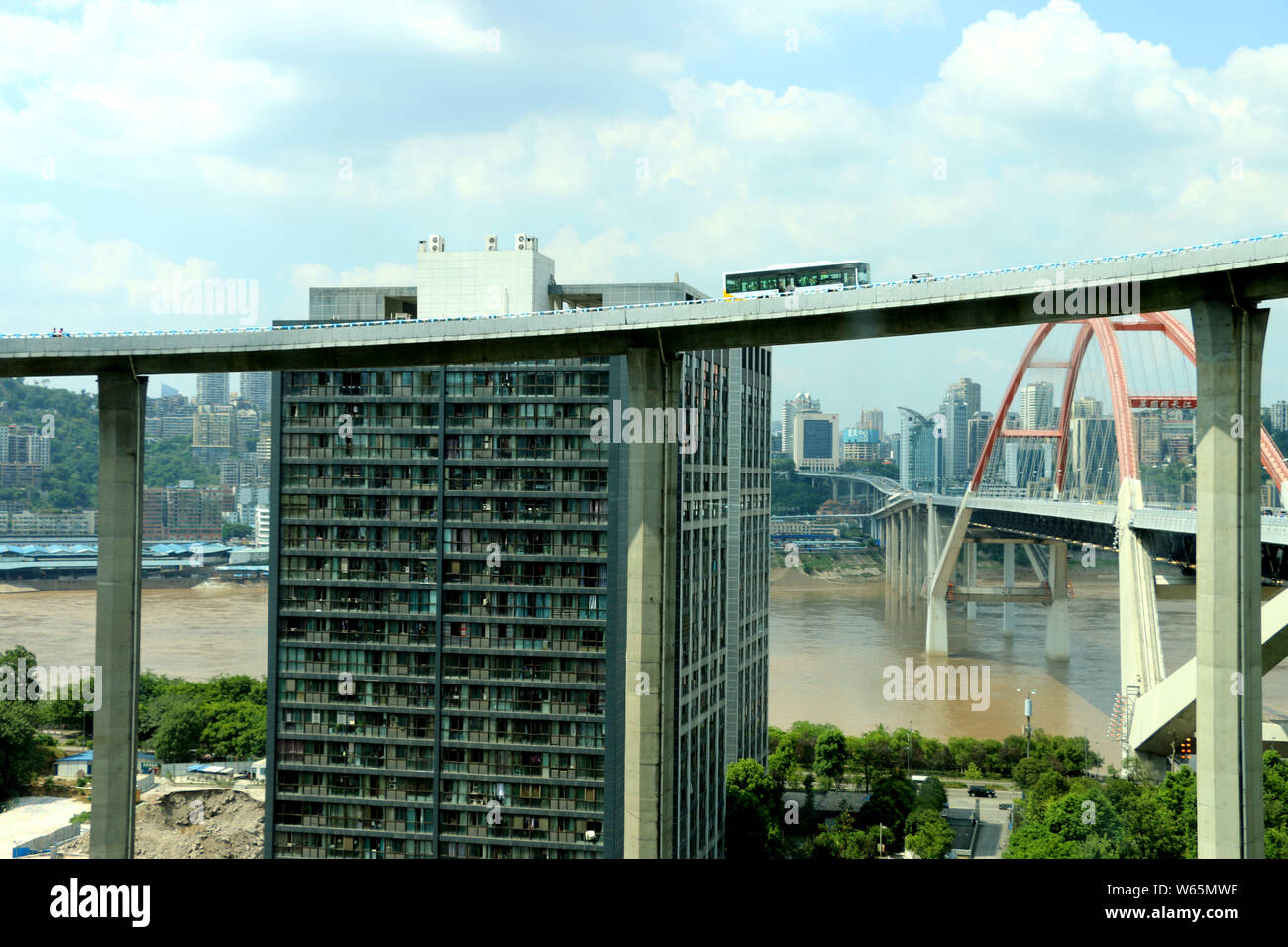 Cars drive on China's tallest highway interchange, Sujiaba Interchange ...