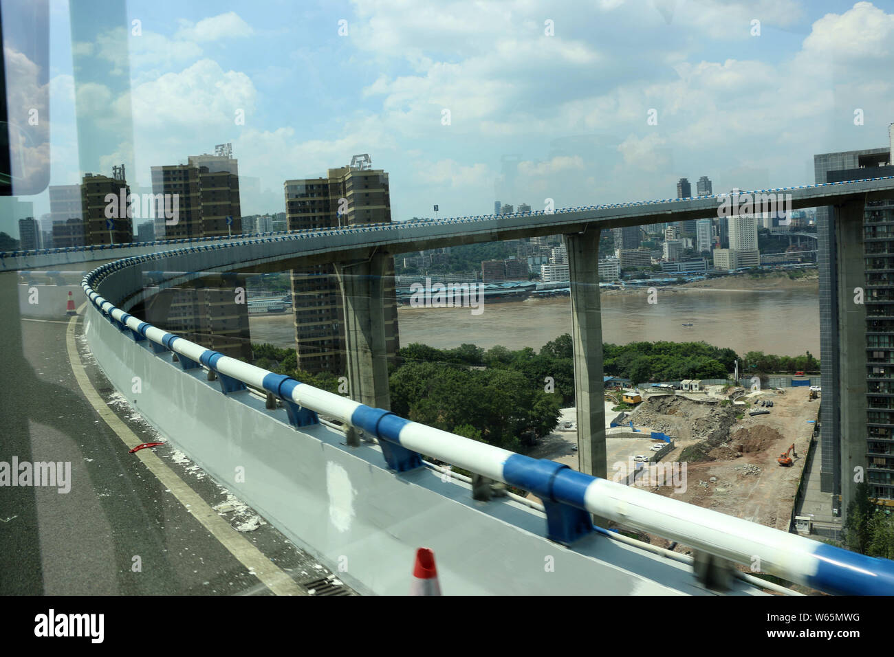 Cars drive on China's tallest highway interchange, Sujiaba Interchange ...