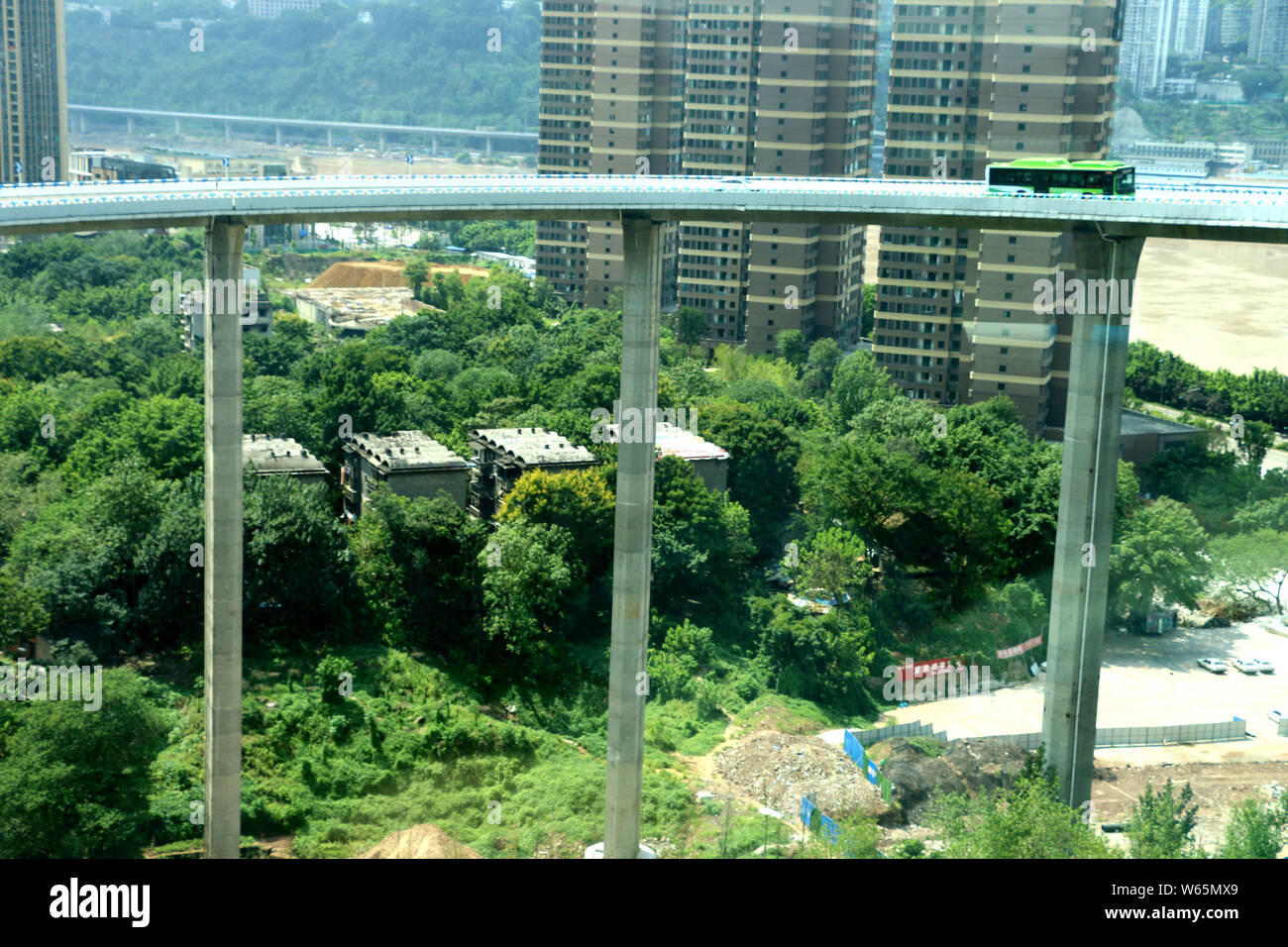 Cars drive on China's tallest highway interchange, Sujiaba Interchange ...