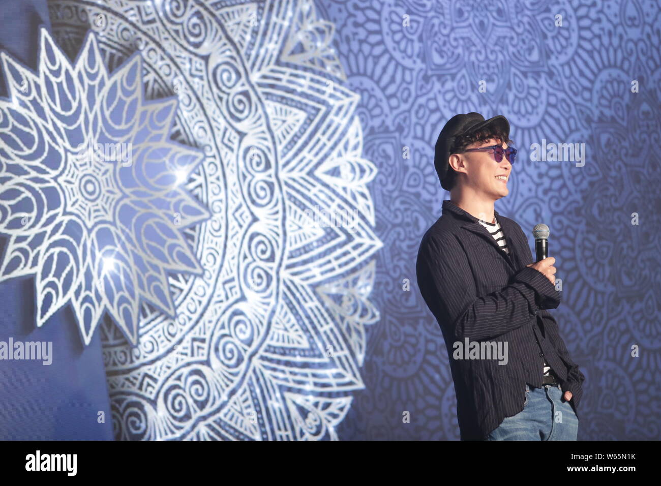 Hong Kong singer Eason Chan attends a ceremony of Universal Music in ...