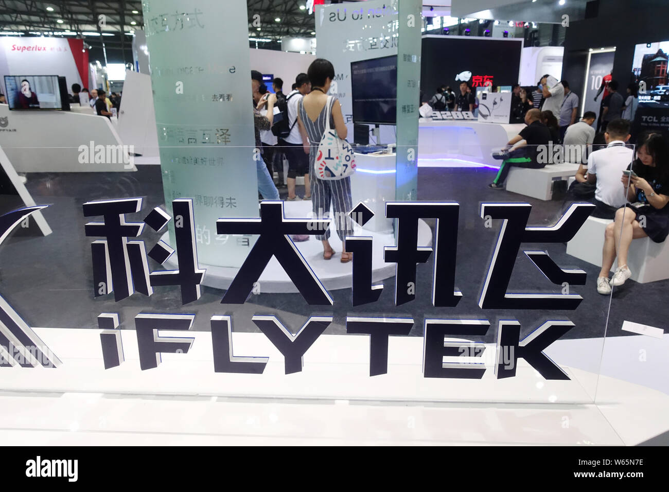--FILE--People visit the stand of iFlytek during an exhibition in ...