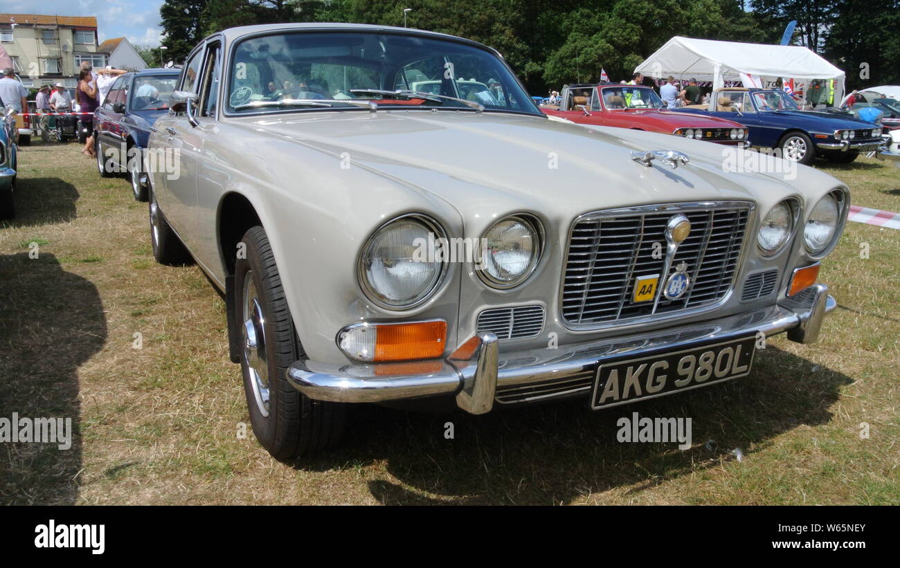 A 1972 Jaguar car parked up on display at the English Riviera classic ...