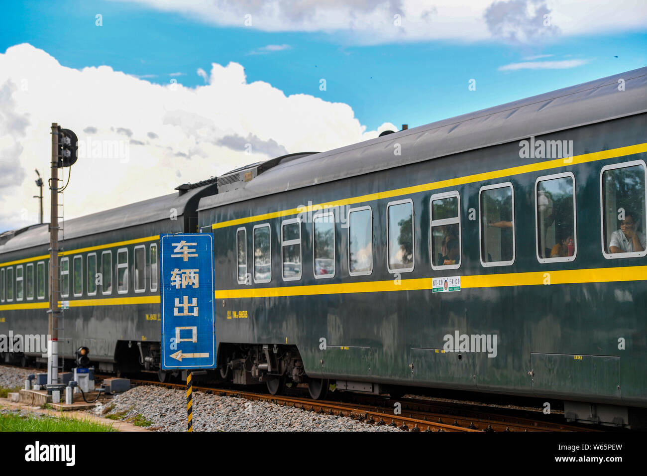 --FILE--Passenger trains runs to disembark from a ferry at the Nangang ...