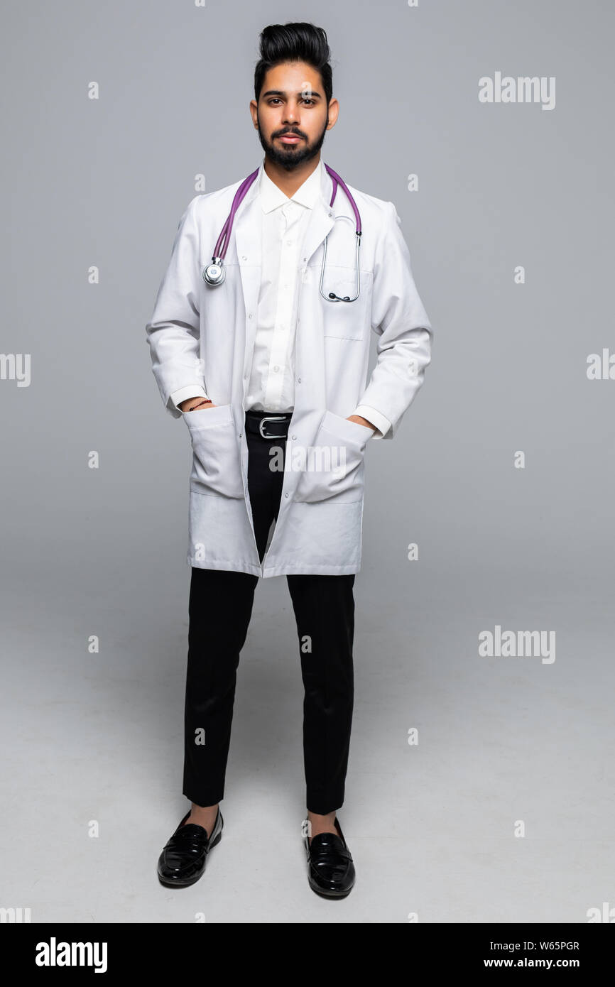 Male Indian doctor wearing a white coat and stethoscope. Isolated on ...