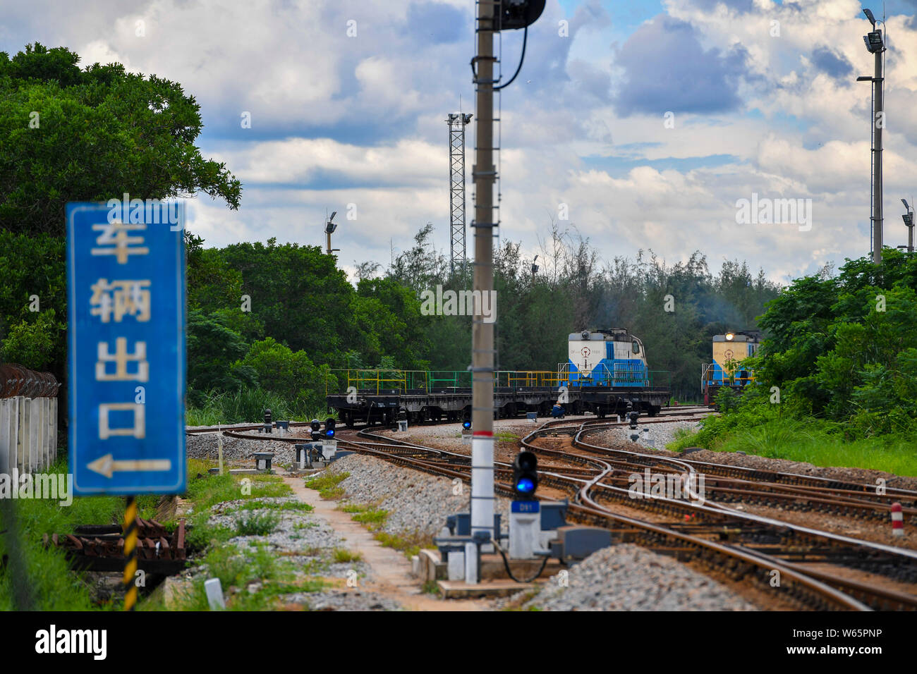 --FILE--Passenger trains runs to disembark from a ferry at the Nangang ...