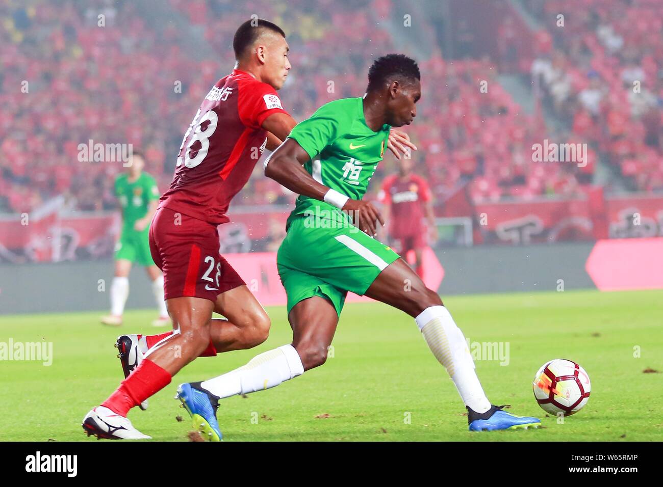 Gambian football player Bubacarr Trawally, right, also known as Steve ...