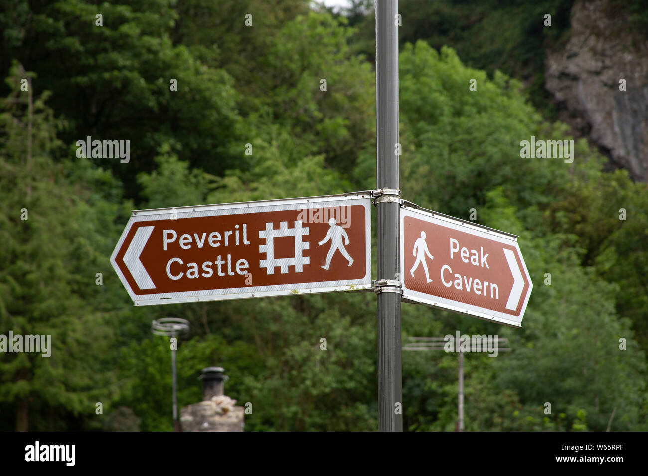 Peak District brown heritage sign pointing to Peverill Castle and Peak ...