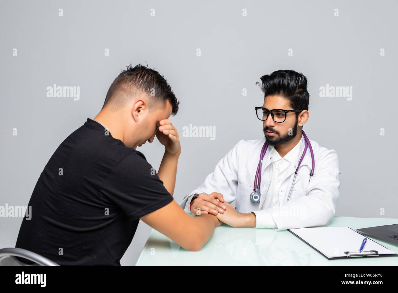 Doctor Treating Male Patient Suffering With Depression Stock Photo - Alamy