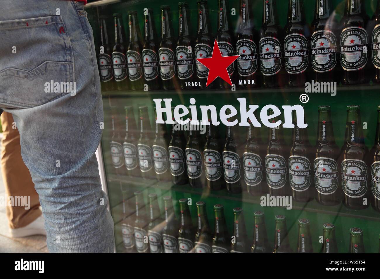 --FILE--Bottles of Heineken beer are for sale at a supermarket in ...