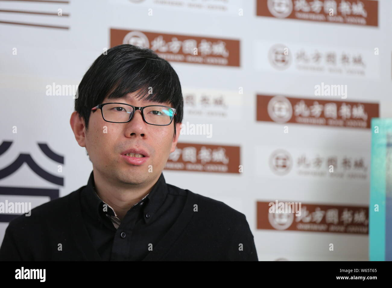 --FILE--Chinese author and writer Cai Jun attends a promotional event ...