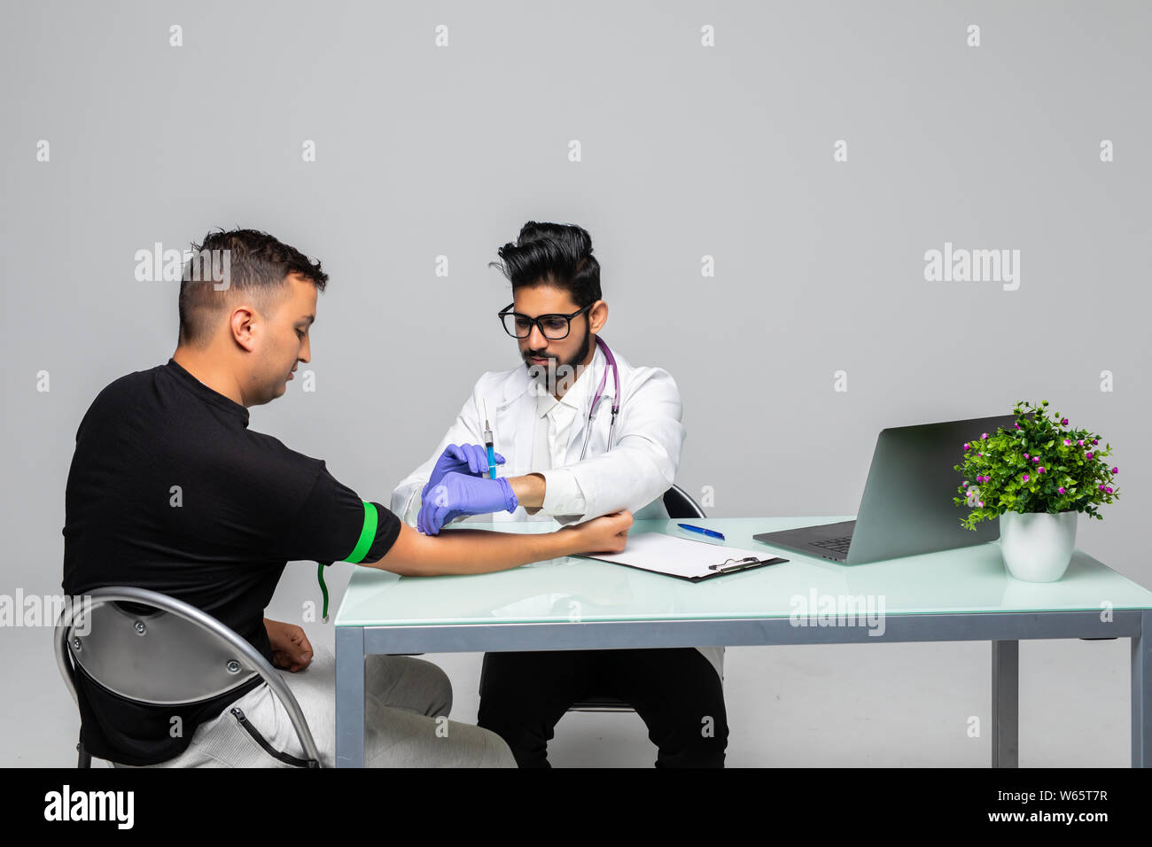 Indian doctor injection hi-res stock photography and images - Alamy