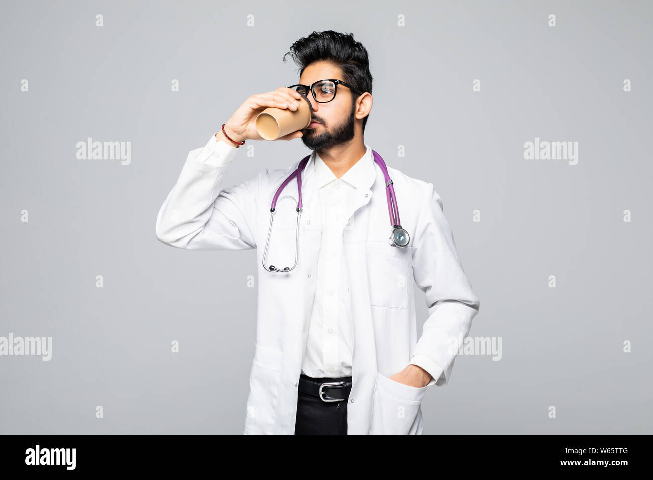Medic or doctor taking coffee break concept isolated on white ...