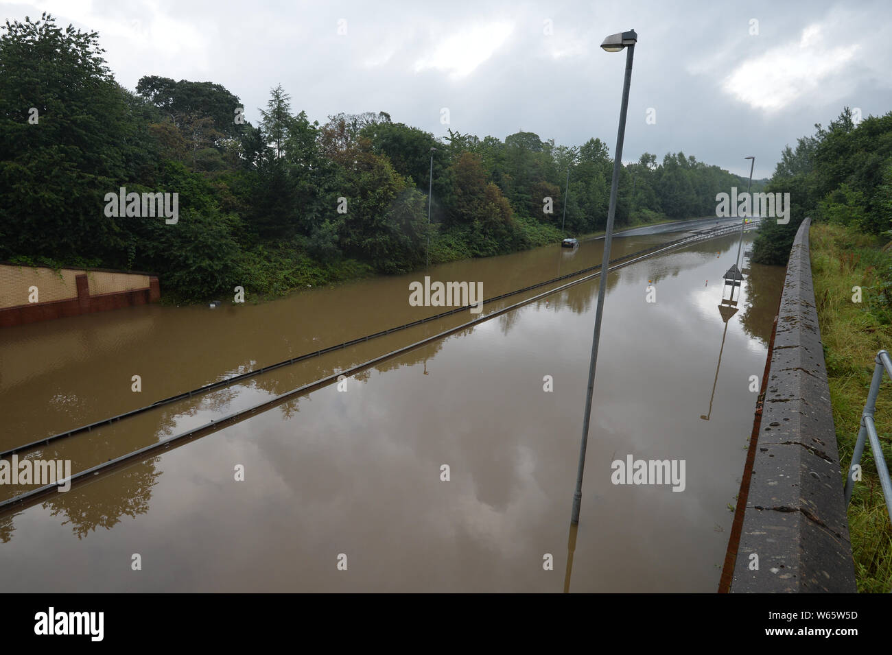Flooding which has closed the A555 in Stockport, Manchester Stock Photo ...