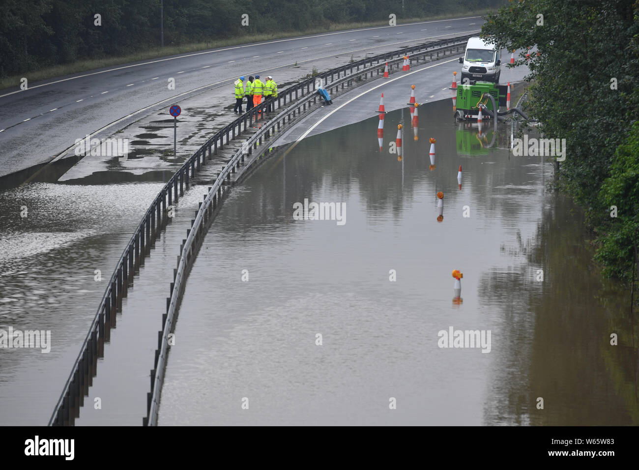 Flooding which has closed the A555 in Stockport, Manchester Stock Photo ...