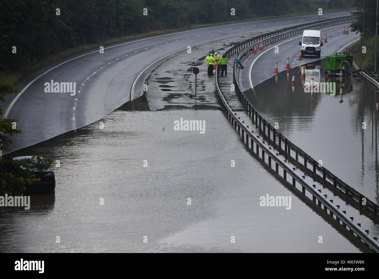 Flooding which has closed the A555 in Stockport, Manchester Stock Photo ...