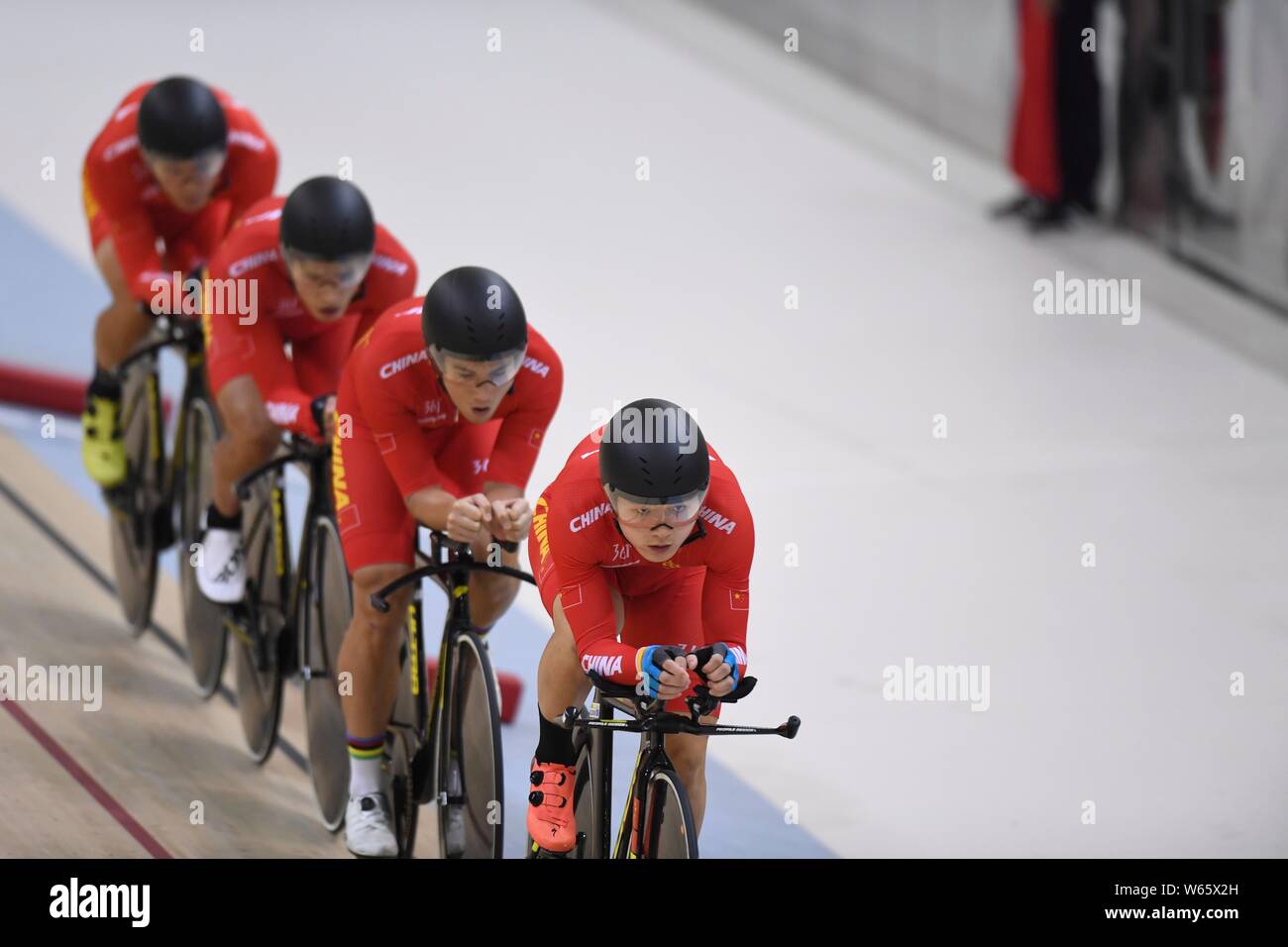 Players of the Chinese men's track cycling team compete in the men's ...