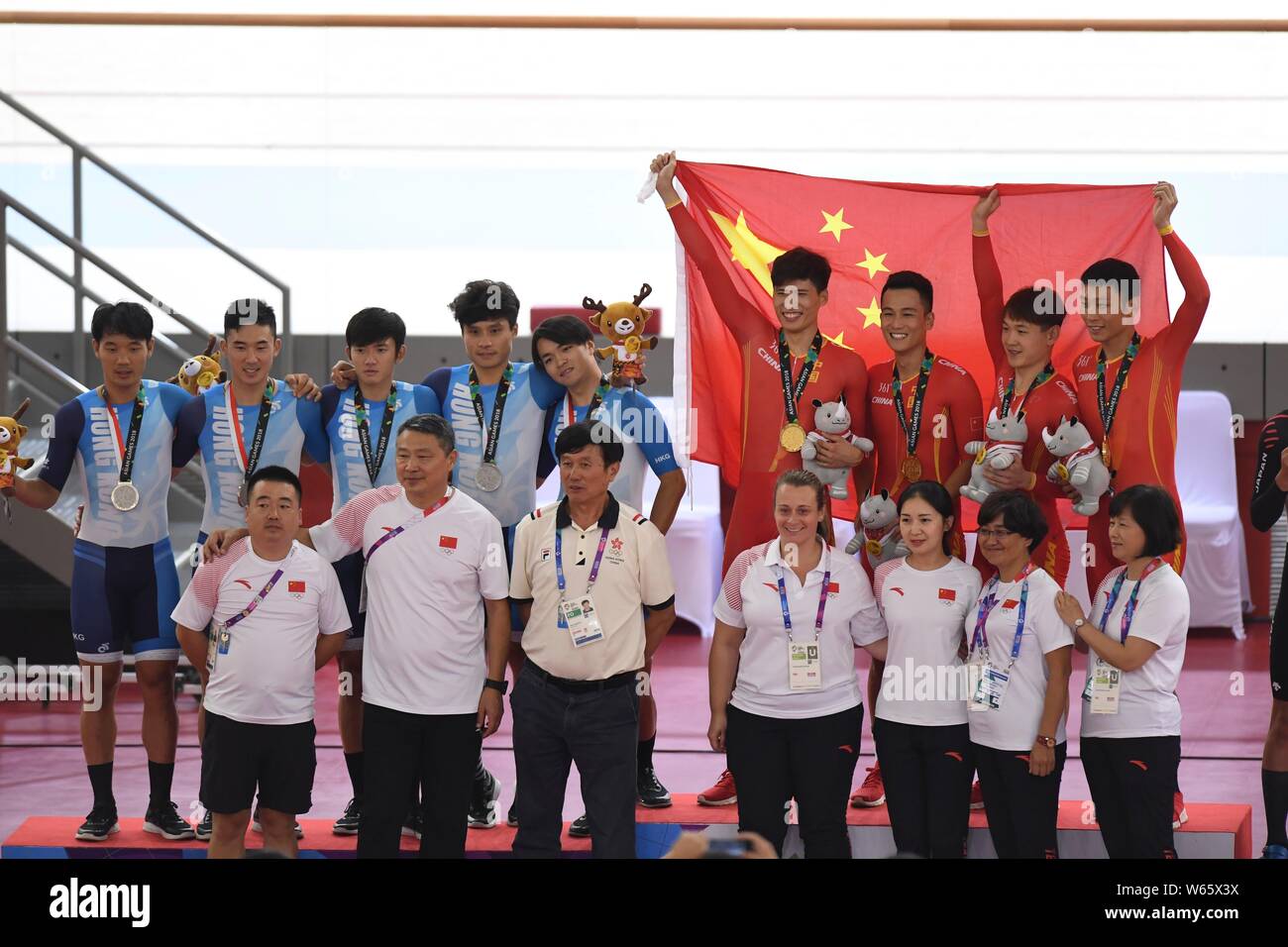 (From left) Silver medalist Team Hong Kong, and gold medalist Team ...