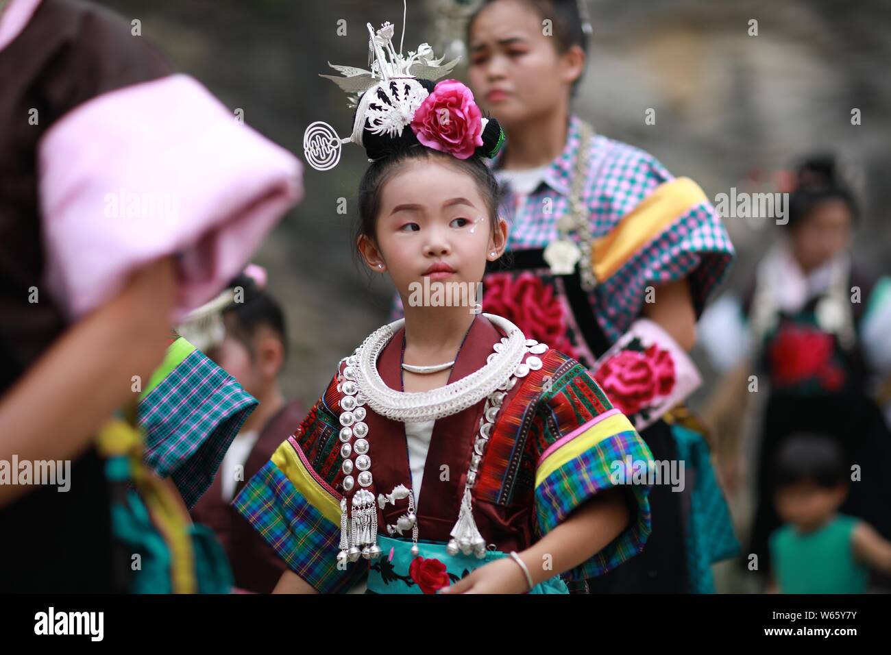 Miao people wearing traditional costumes of Miao ethnic group celebrate ...