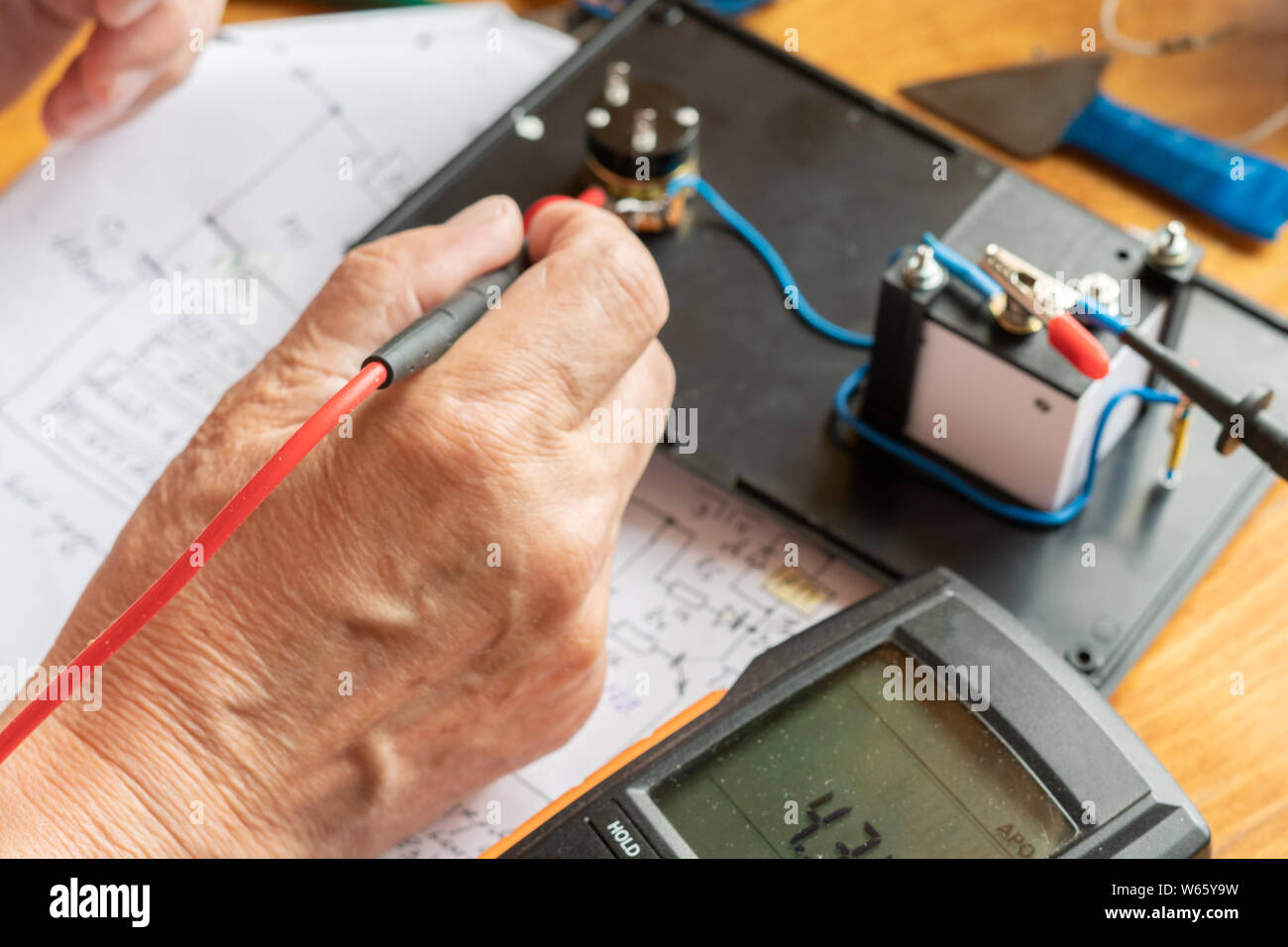 process of making electrical measurements with multimeter, testing the ...