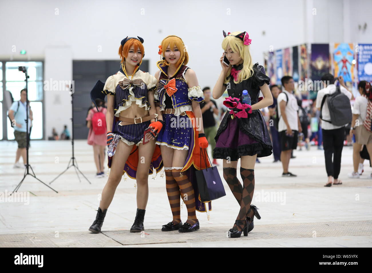 Chinese cosers dressed in cosplay costumes pose during the Beijing ...