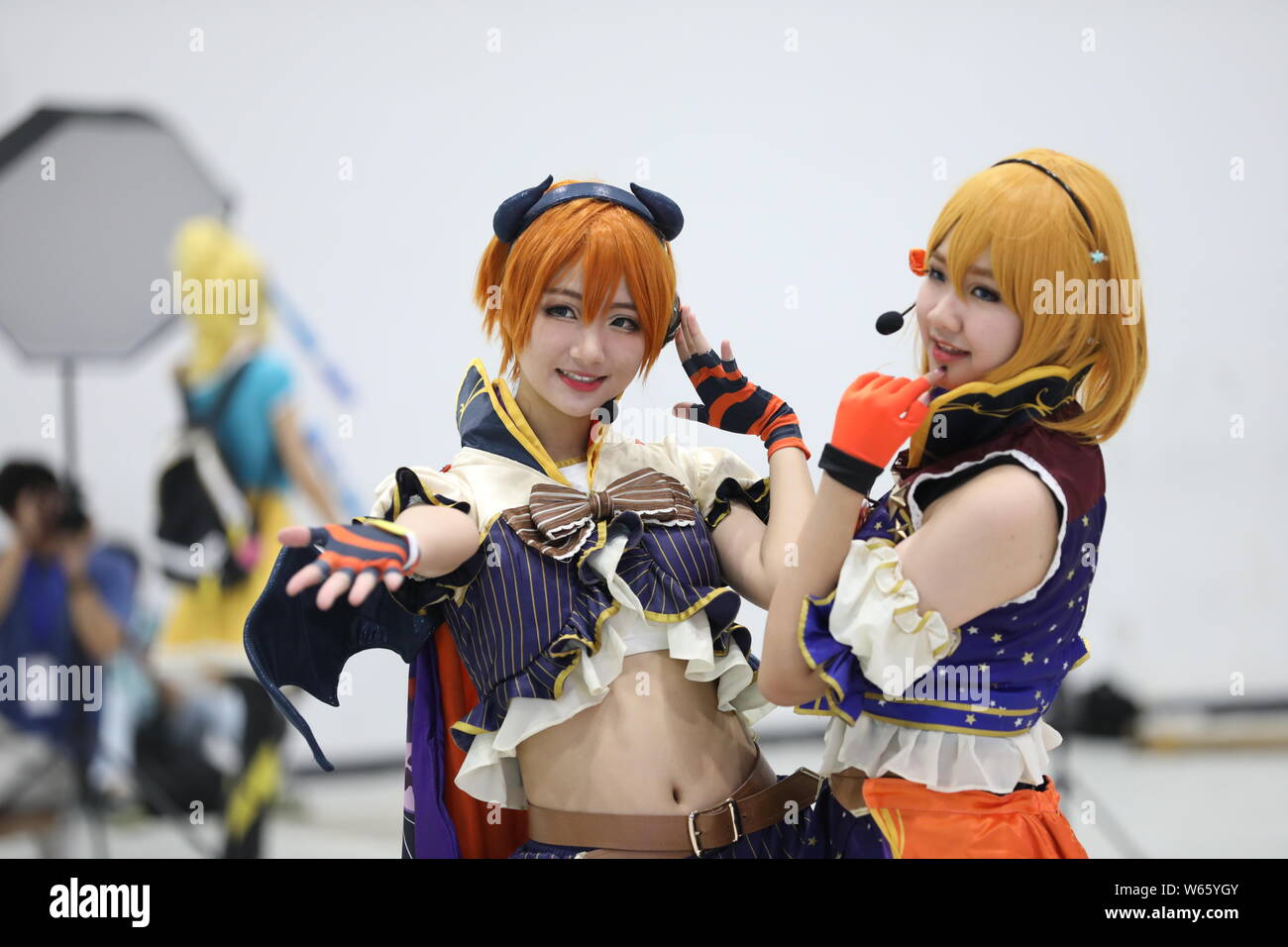 Chinese cosers dressed in cosplay costumes pose during the Beijing ...