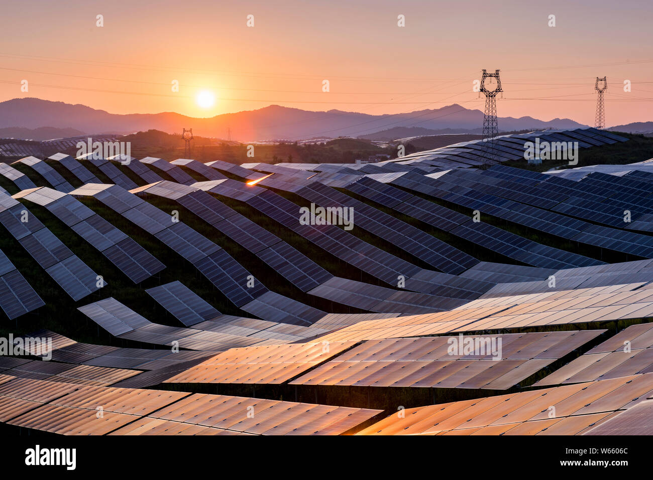 --FILE--Solar panels are installed at a photovoltaic power station in ...