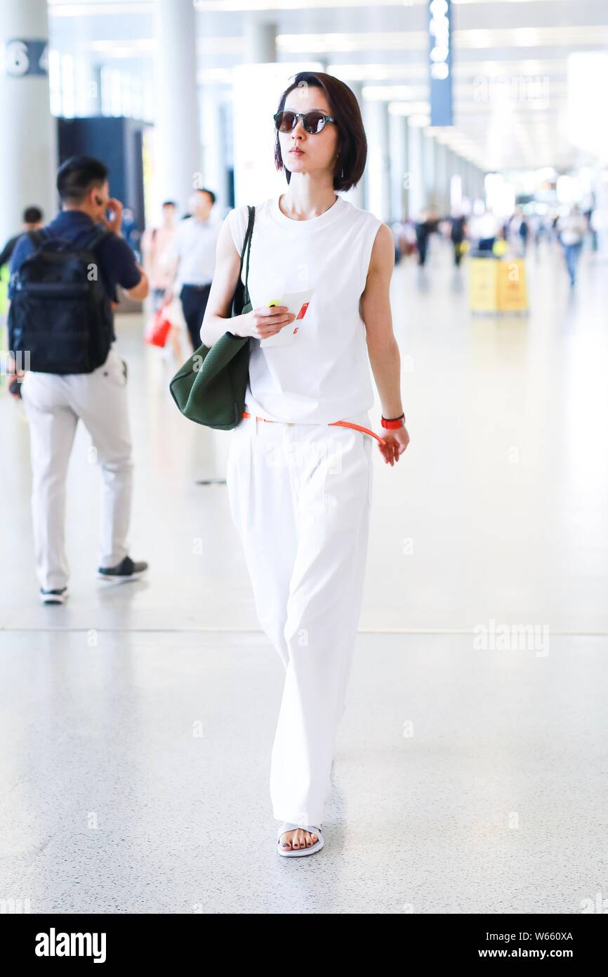 Chinese supermodel Du Juan is pictured at an airport in Shanghai, China ...