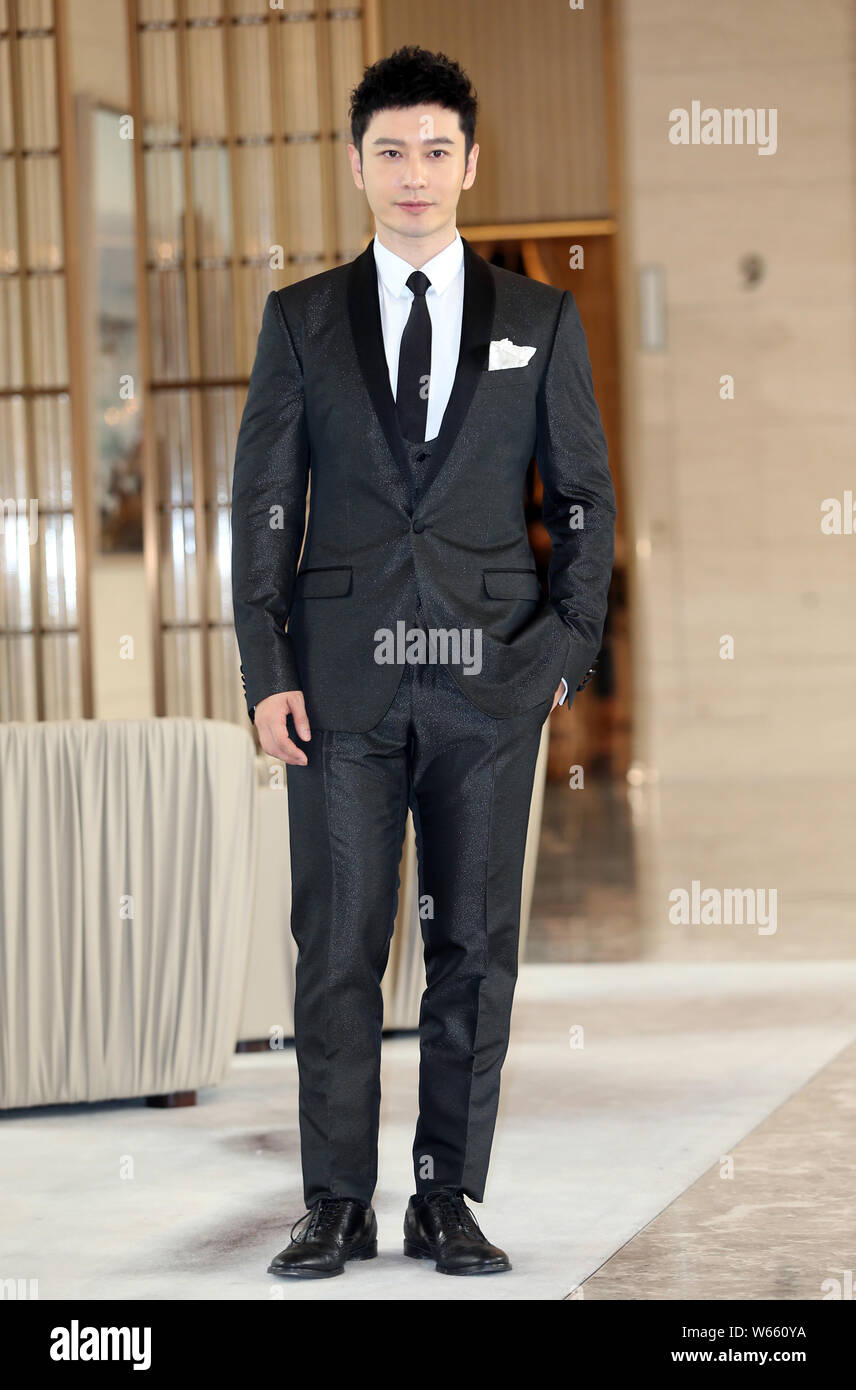 **TAIWAN OUT**Chinese actor Huang Xiaoming poses during the opening ...