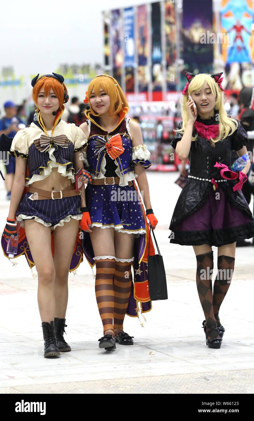 Chinese cosers dressed in cosplay costumes pose during the Beijing ...