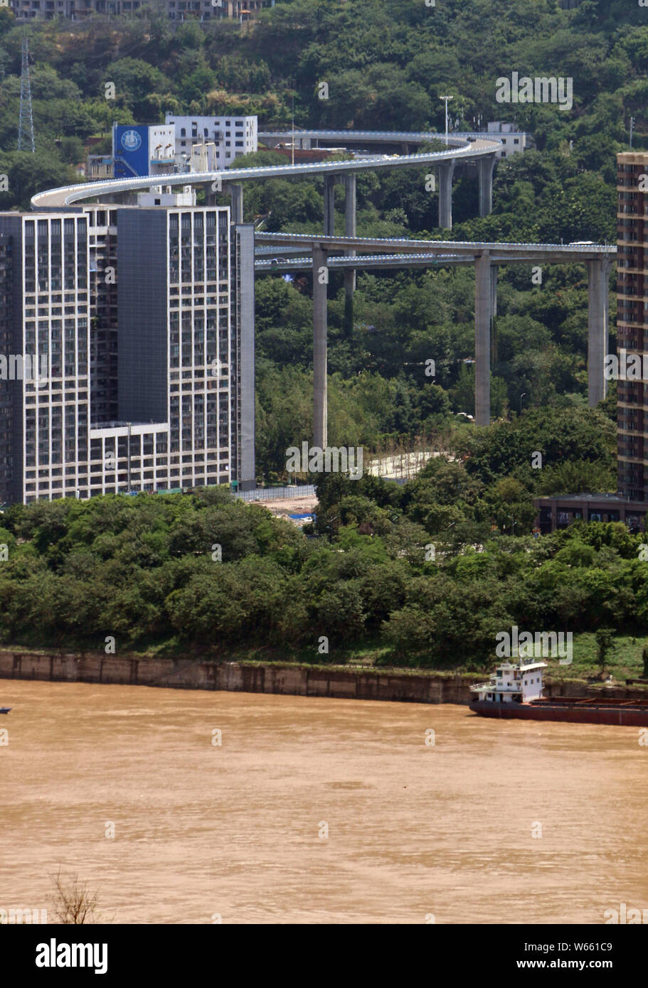 Cars drive on China's tallest highway interchange, Sujiaba Interchange ...