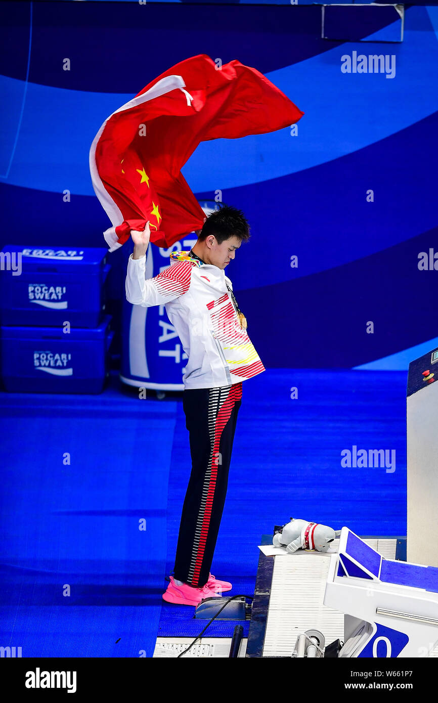 Gold medalist Sun Yang of China celebrates after the medal ceremony of ...